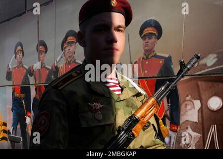 A Russian Rosguardia (National Guard) soldier walks past a military ...