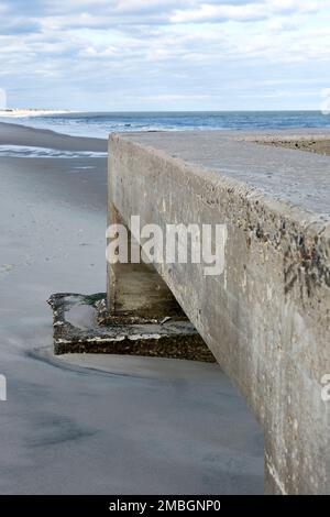 A concrete structure on the beach at Delaware Seashore State Park ...