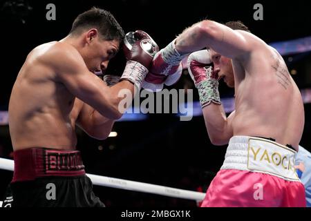 Canelo Alvarez, right, of Mexico, fights against Dmitry Bivol, of ...