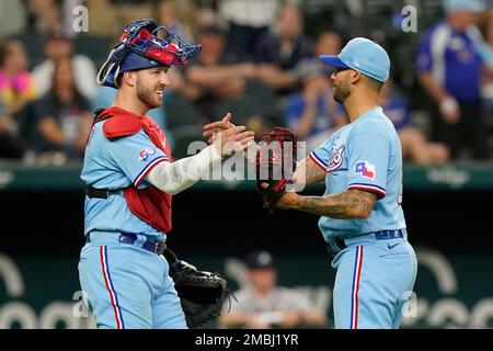 Texas Rangers catcher Mitch Garver (18) prepares to swing at a pitch in ...