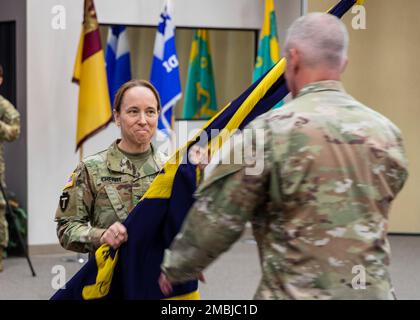 Command Sergeant Major Cloyd E. Bookout passes the NGPEC flag to Col ...