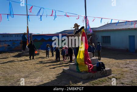 Students from the Irohito Urus Indigenous group look at a robot made ...