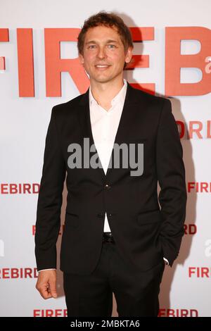 Director Peeter Rebane poses for photographers upon arrival at the UK ...