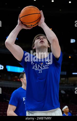 Kansas's Zach Clemence warms up before a college basketball game in the ...