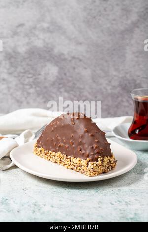 Malaga cake. Chocolate and banana cake on a dark background. close up ...
