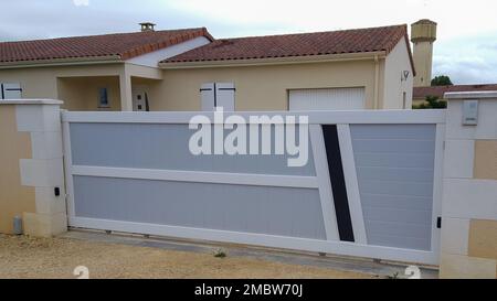 modern white gate pvc plastic portal with blades of suburbs house Stock ...