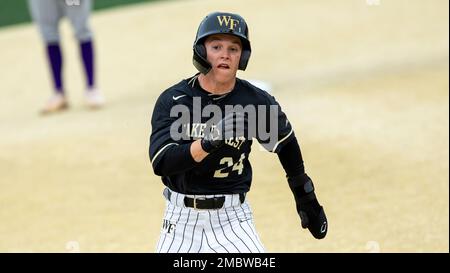 Wake Forest's Tommy Hawke (24) dives for a ball hit to center field by ...