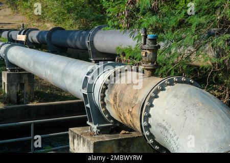 Pipe is installed along the bridge on the pipe support. Water steel ...