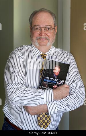 Chicago Tribune investigative reporter Ray Long poses for a portrait at ...