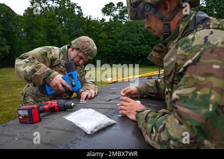 U.S. Army Spc. Owen Johnson, an aircraft structural repairer assigned ...