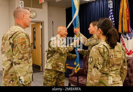 Col. Joe Ratliff, outgoing Eastern Sector commander, receives the ...