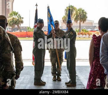 Col. Greg Moseley, 325th Fighter Wing commander (left), passes the ...
