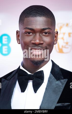 Victor Kunda poses for photographers upon arrival for the premiere of ...