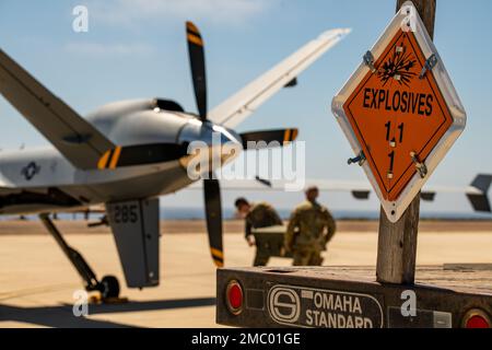 Airmen assigned to the 163d Attack Wing board a C-17 aircraft assigned ...