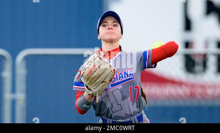 Louisiana Tech outfielder Katelin Cooper (17) throws during an NCAA ...