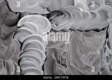 White paint strokes on a shop window, abstract background or texture ...