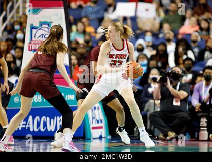North Carolina State center Elissa Cunane (33) hugs forward Erika ...