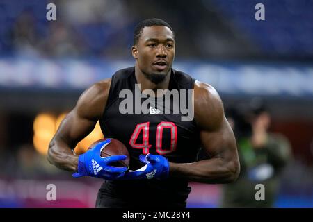 Miami (Ohio) defensive lineman Dominique Robinson runs a drill during ...