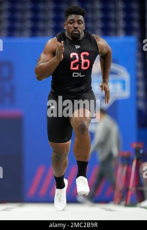 Stanford defensive lineman Thomas Booker runs the 40-yard dash at the NFL football scouting ...
