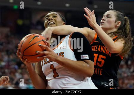 Texas center Lauren Ebo (1) is fouled by Oklahoma State guard Lauren ...