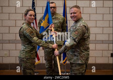 Col. Elizabeth Somsel, 7th Medical Group commander, cases the colors of ...