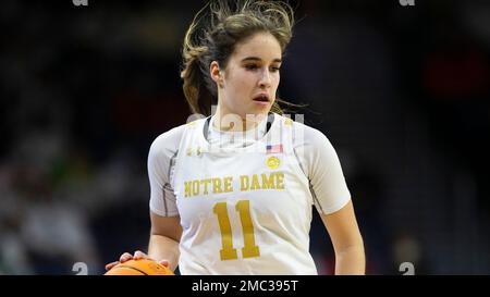 Notre Dame's Sonia Citron (11) looks to pass around Louisville's Payton ...