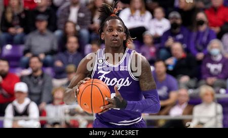 TCU guard Damion Baugh prepares to make a pass during an NCAA college ...