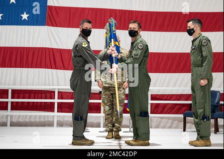 Col. Scott Mills, 57th Operations Group commander, passes the guidon of ...