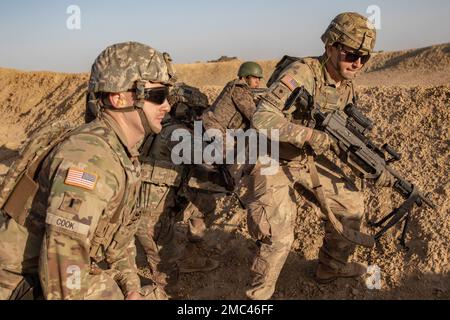 Soldiers of the 1ST Infantry Battalion Senegal Army reload ammunition ...
