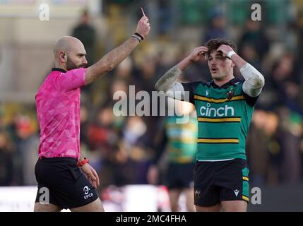 Referee Andrea Piardi shows a red card to Northampton Saints' Lukhan ...