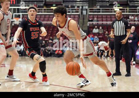 Utah guard Gabe Madsen (55) shoots over Stanford forward Jaiden Delaire ...
