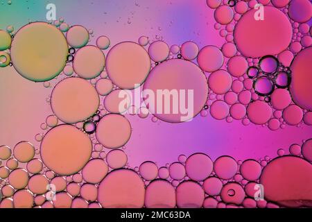 multi colored oil circles on the water, colorful background Stock Photo ...