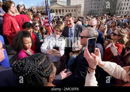 Virginia Gov. Glenn Youngkin, center, and his wife, Suzanne, right ...