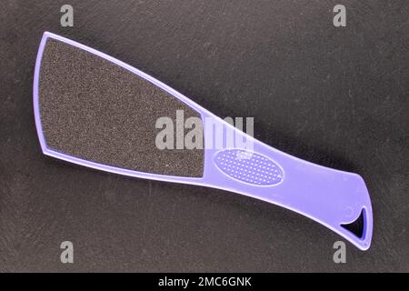 Grinding foot saw on slate stone, macro, top view Stock Photo - Alamy