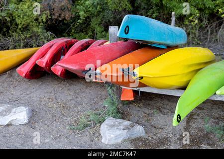 Colorful kayaks at the beach of Lago General Carrera near the famous ...