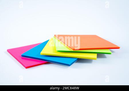pack of bright colored transparent jot note pads with jar of paper ...