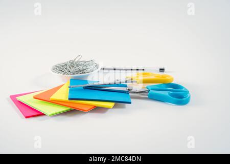 pack of bright colored transparent jot note pads with jar of paper ...