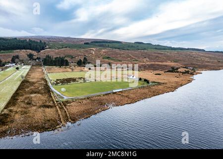 Aerial view of the GAA pitch next to Mount Errigal in Donegal - Ireland ...