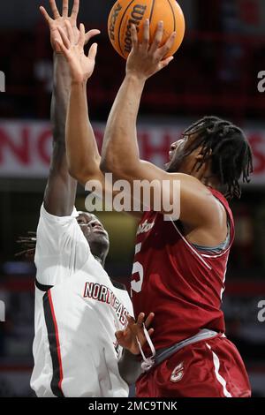 College of Charleston's Pat Robinson III (15) is celebrated by teammate ...