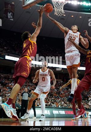 Iowa State forward George Conditt IV (4) celebrates with teammates on ...