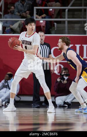 La Salle guard Christian Ray (24) shoots over Davidson forward Sam ...