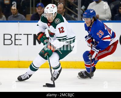 Minnesota Wild's Matt Boldy (12) celebrates his goal with Jonas Brodin ...
