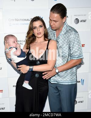 L-R: Julia Fox (with son Valentino) and Peter Artemiev attend the world ...