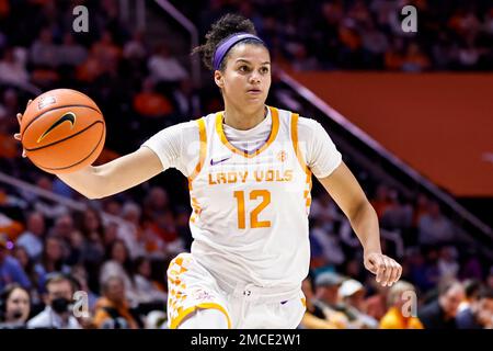 Tennessee guard Rae Burrell (12) drives against Vanderbilt forward ...