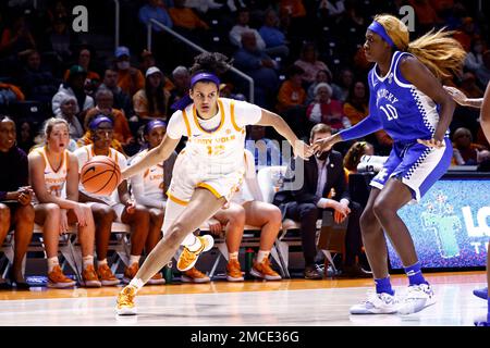 Tennessee guard Rae Burrell (12) drives against Vanderbilt forward ...