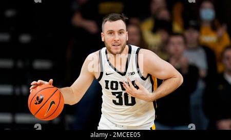 Iowa guard Connor McCaffery (30) steals the ball from Indiana guard ...