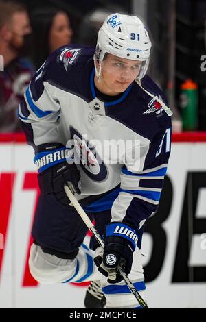 Winnipeg Jets forward Cole Perfetti warms up before the start of an NHL ...