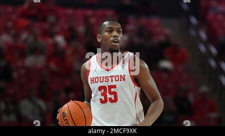 Houston forward Fabian White Jr. (35) jumps for a rebound against ...