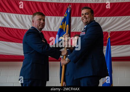 Col. John Poole, 317th Operations Group commander, hands the guidon to ...