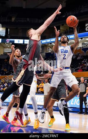 Pittsburgh's Femi Odukale, left, defends North Carolina State's DJ ...